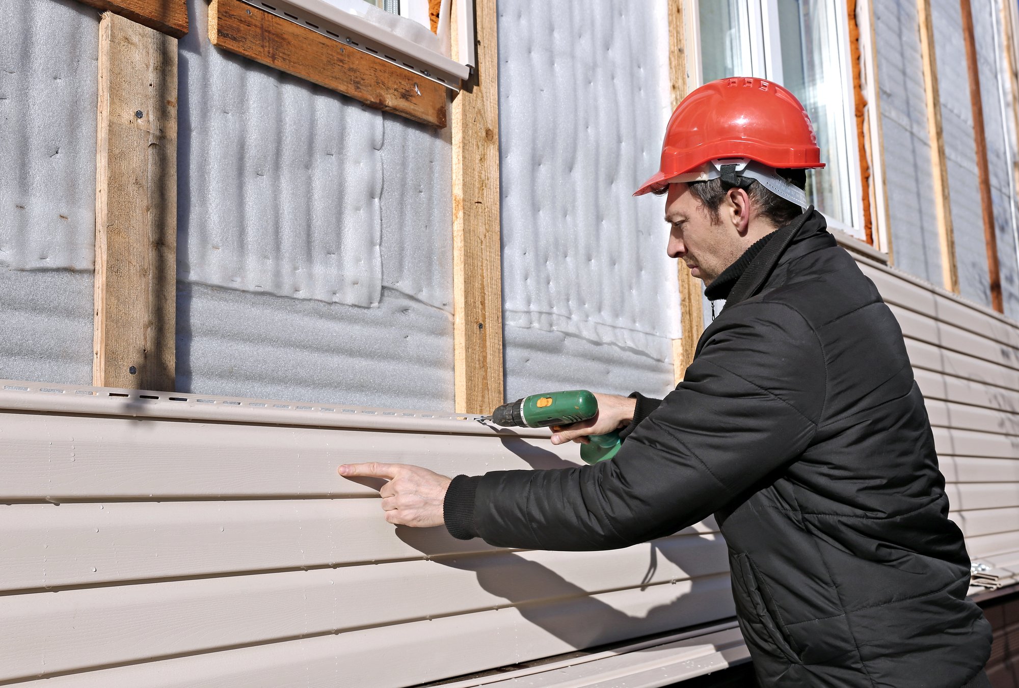 Can you reclad a house yourself? Recladding House